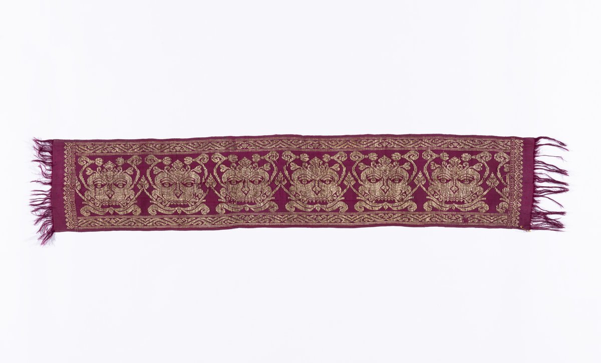 Ceremonial waist sash (sabut songket) with repeating demonic face ...